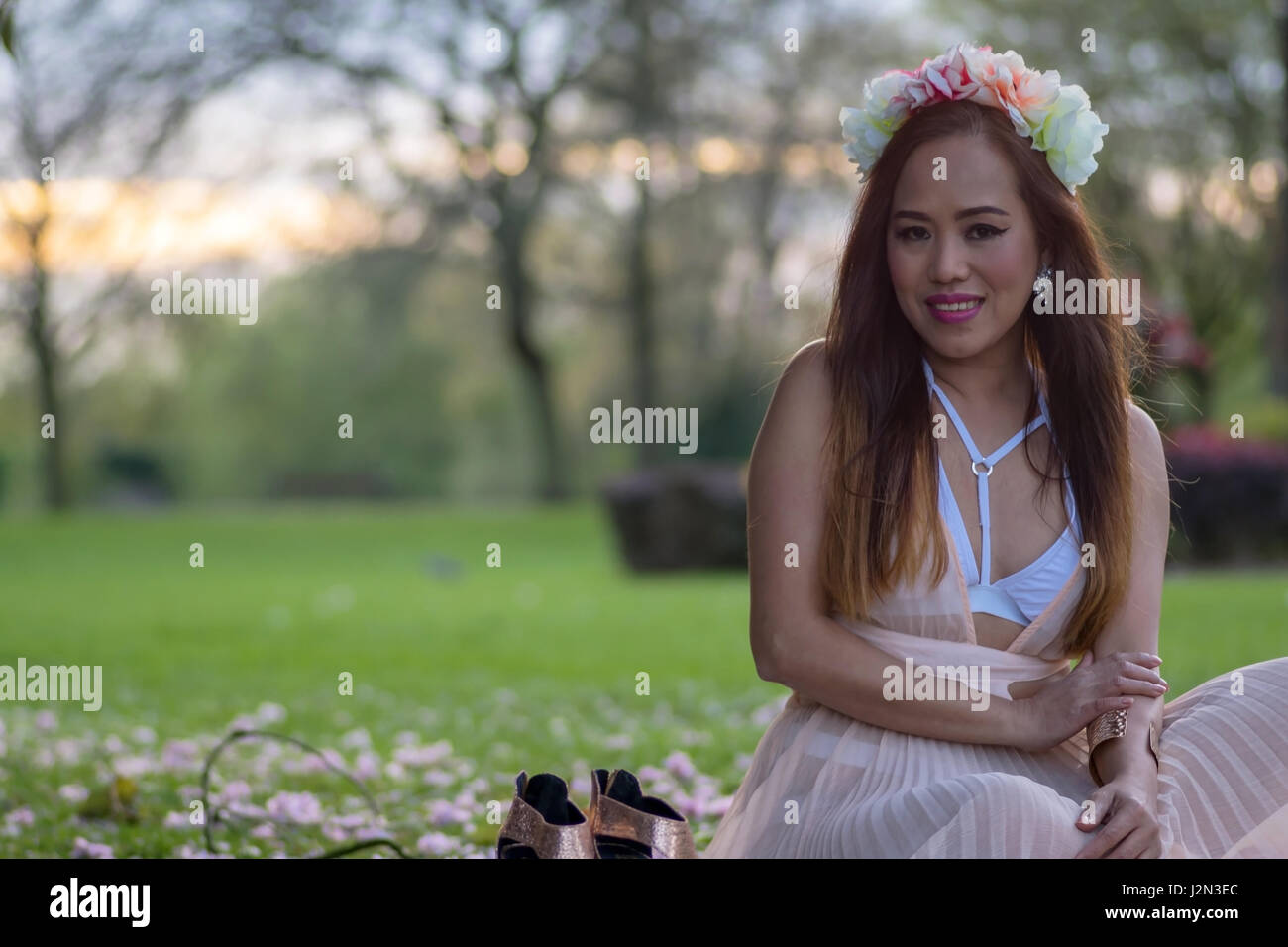 Filipino model southeast asian beauty with a local park as a backdrop ...