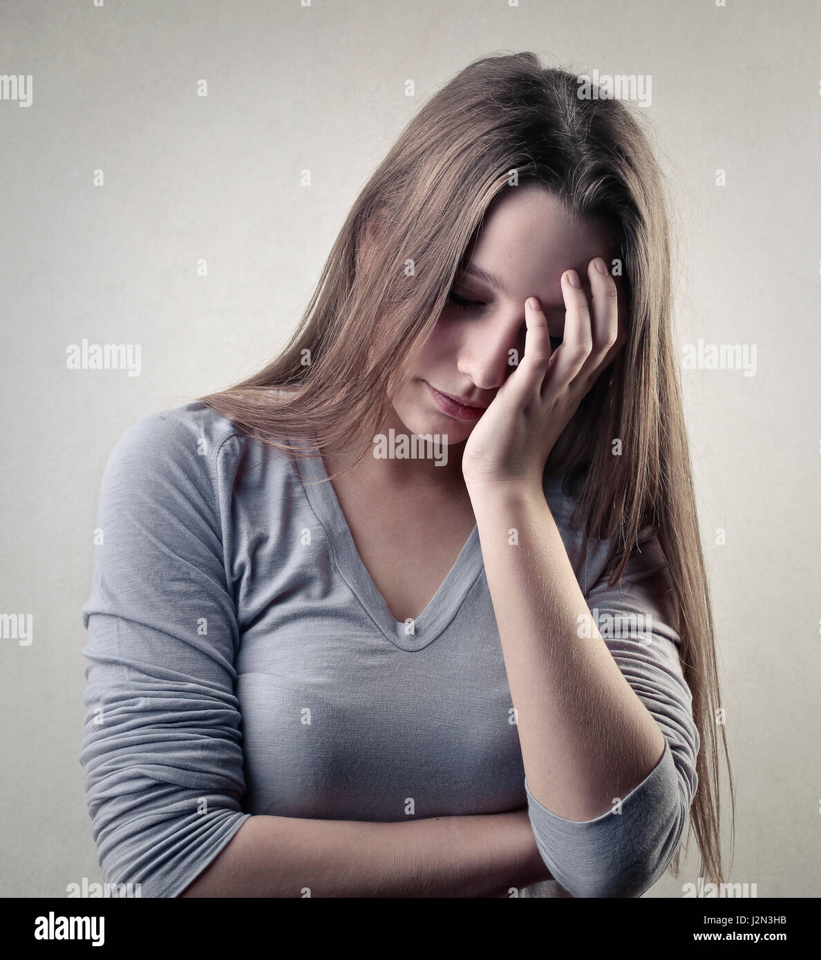Depressed woman being sad Stock Photo - Alamy