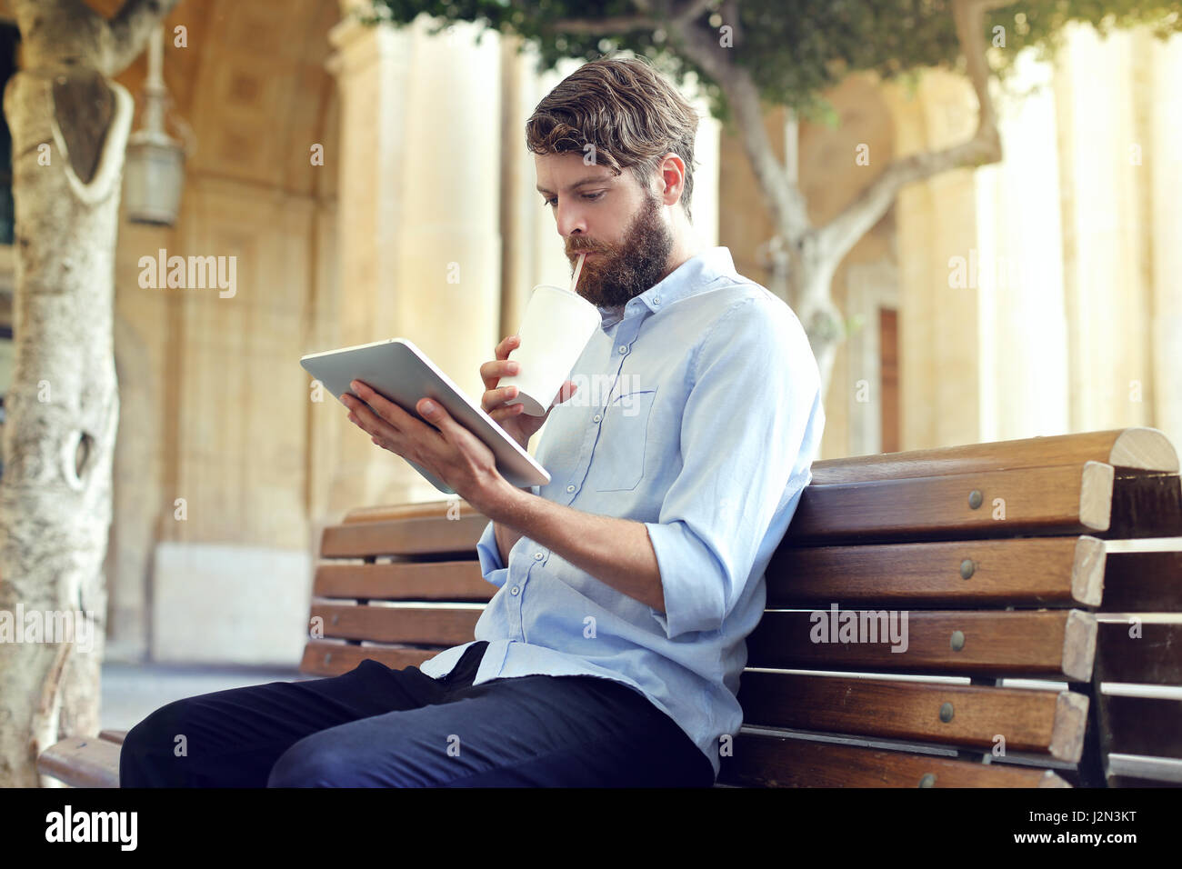 Man on bench hi-res stock photography and images - Alamy