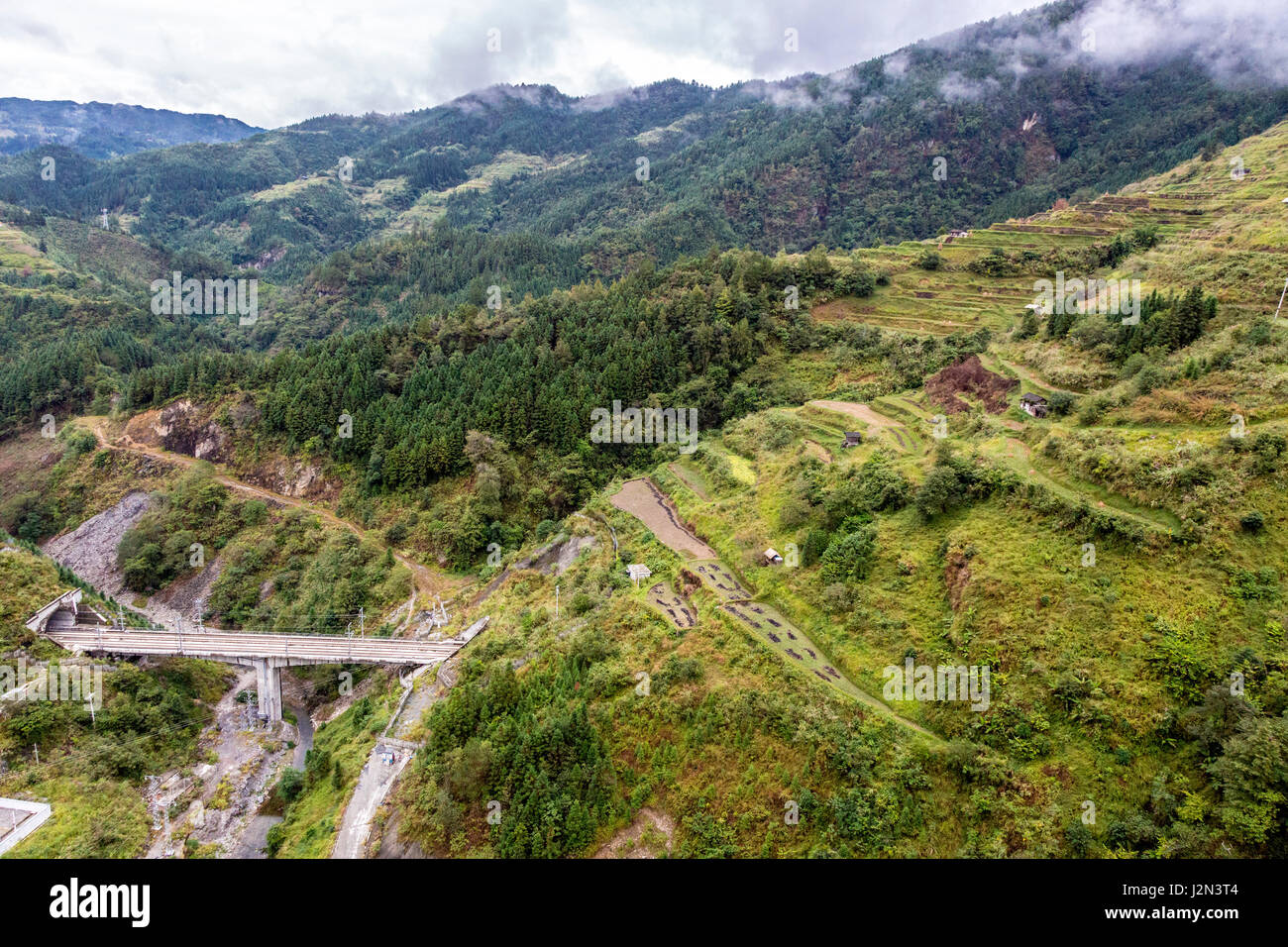 Guizhou, China. Forested Hillsides, Terraced Farming, Highway Bridge ...