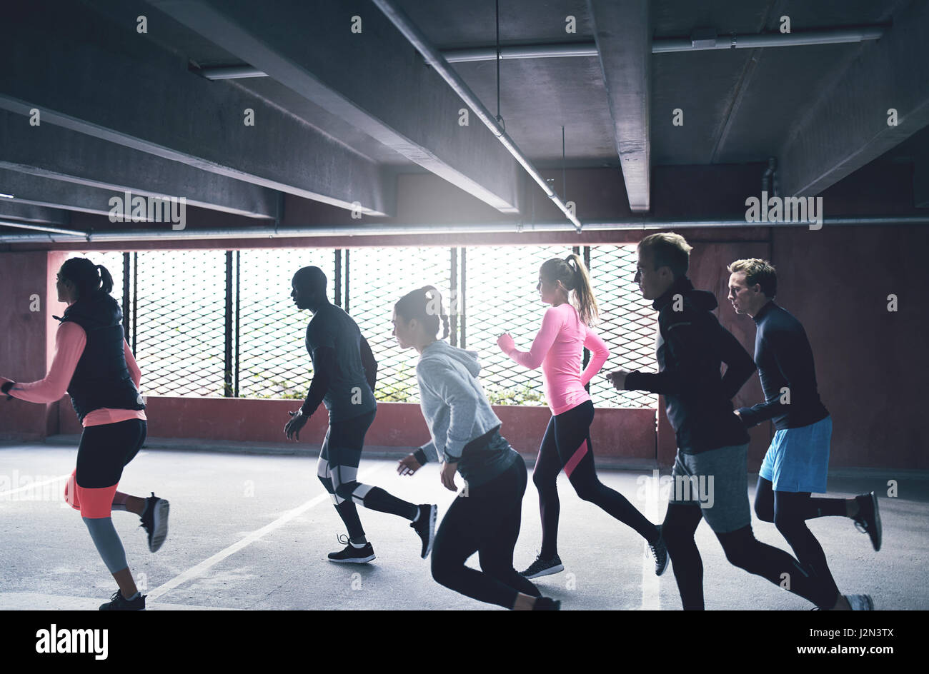 Group men sprinting indoors hi-res stock photography and images - Alamy