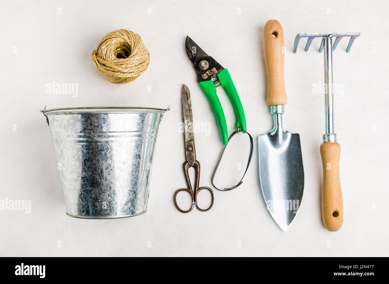Garden tools for planting, on white background Stock Photo - Alamy