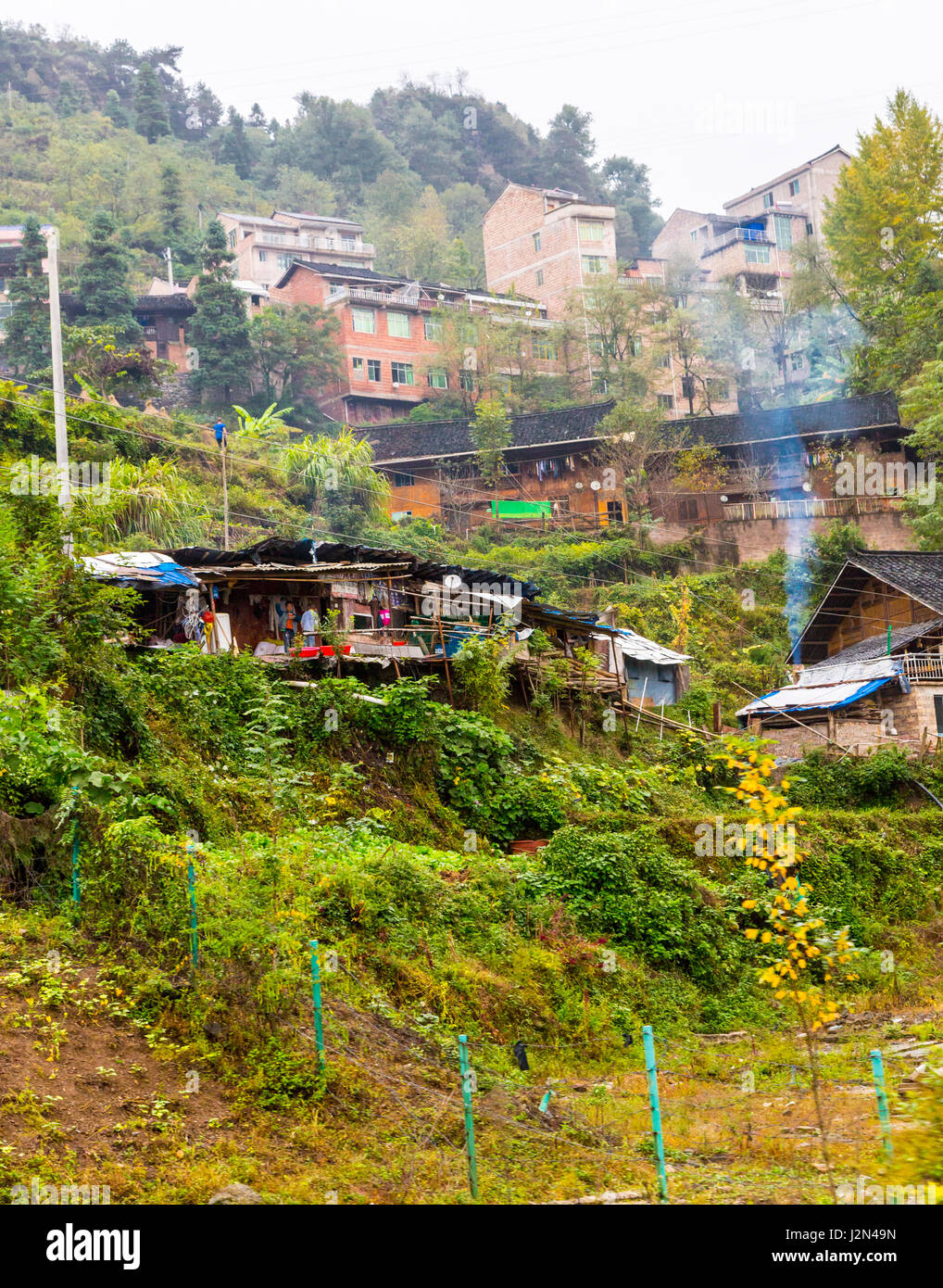 Guizhou, China. Hillside Houses between Kaili and Zhenyuan Stock Photo ...