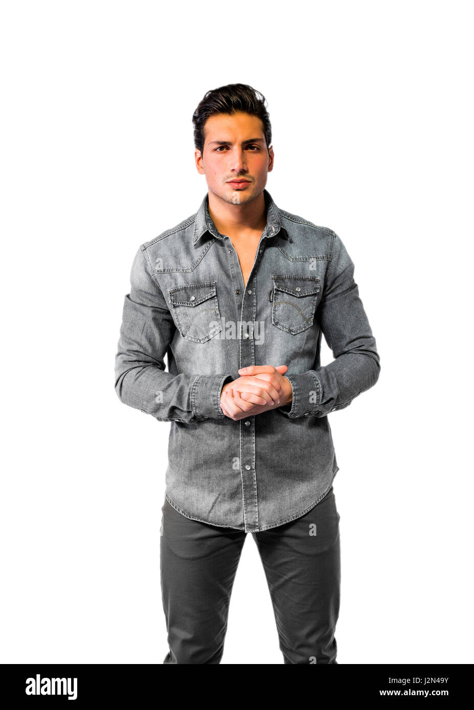 Confident, attractive young man with denim shirt Stock Photo - Alamy