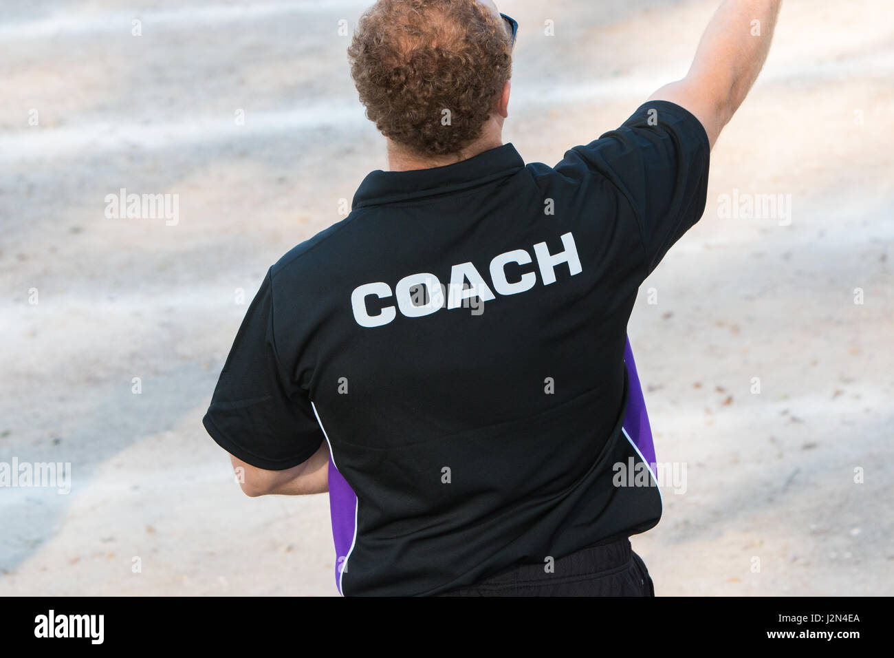 Coach on the back of shirt hi-res stock photography and images - Alamy