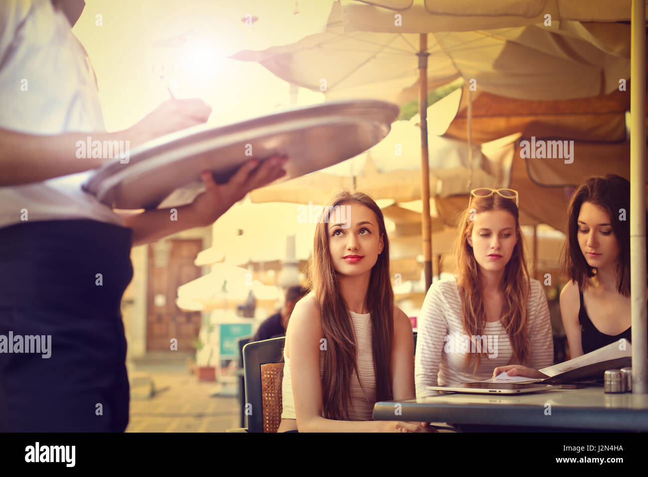 Teenager restaurant waiter hi-res stock photography and images - Alamy