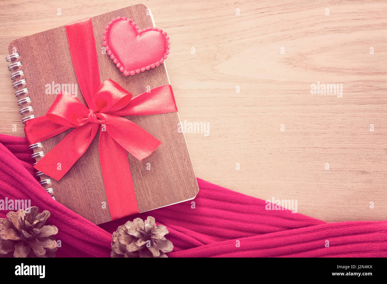 Books wrapped in ribbon hi-res stock photography and images - Alamy