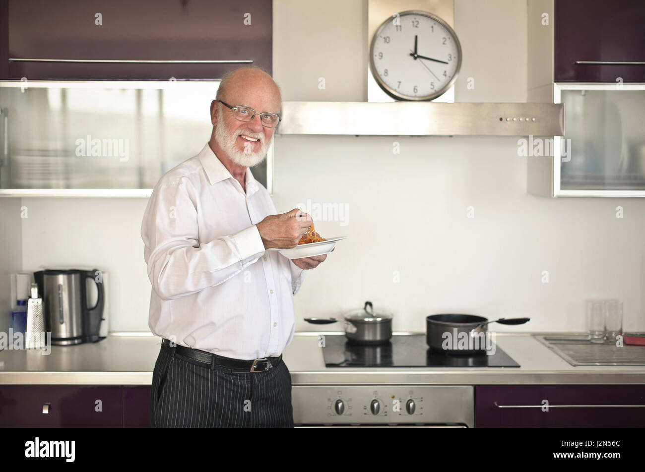 Old man eating spaghetti hi-res stock photography and images - Alamy
