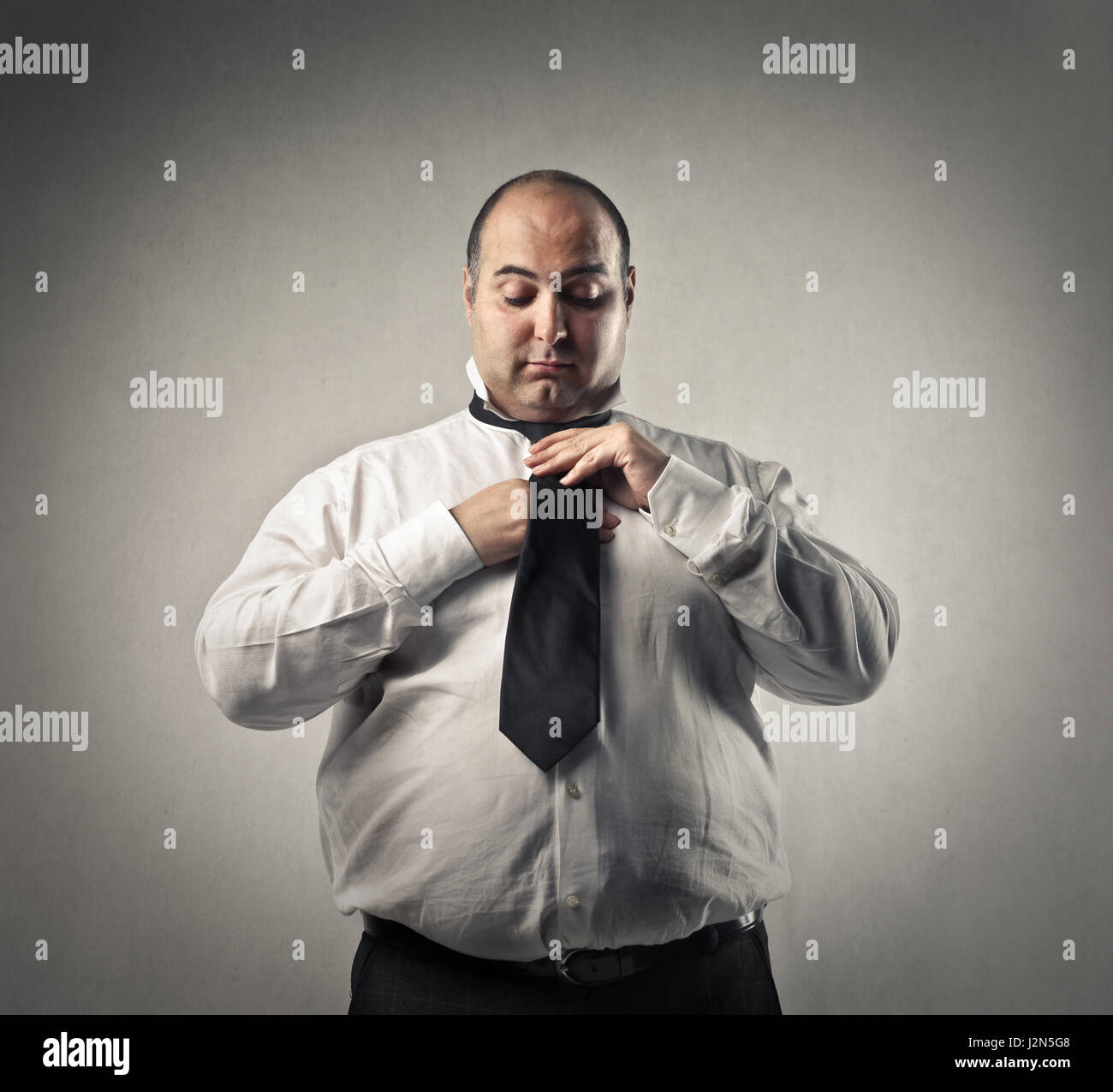 Fat businessman hi-res stock photography and images - Alamy