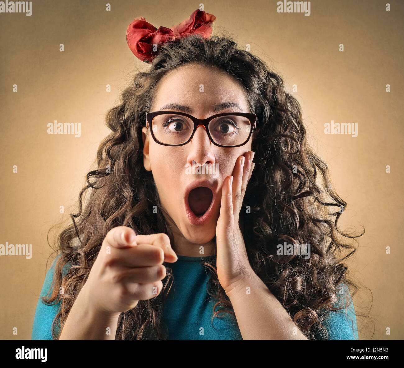 Curly hair woman shocked hi-res stock photography and images - Alamy