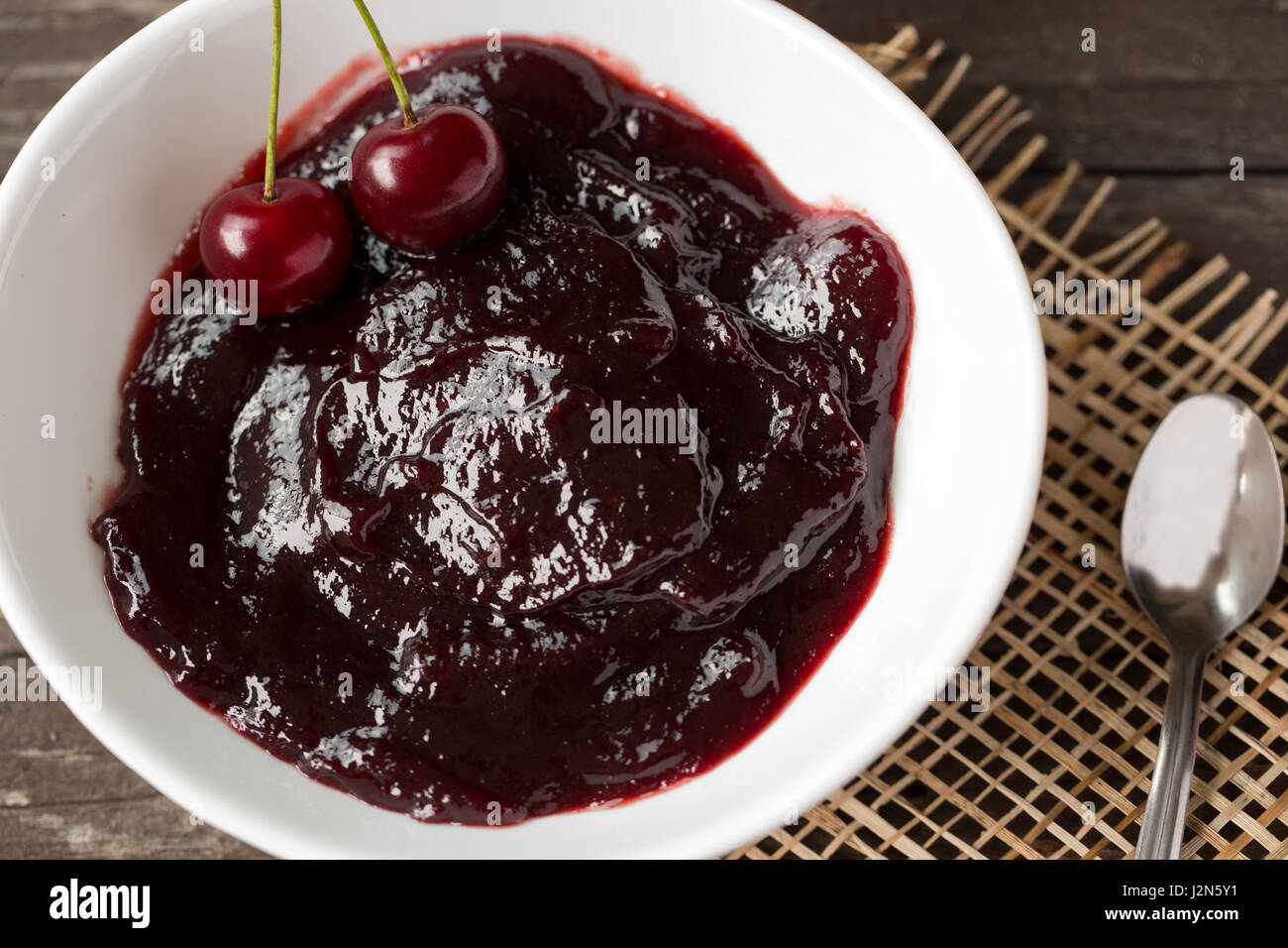 Homemade organic red cherry jam Stock Photo - Alamy