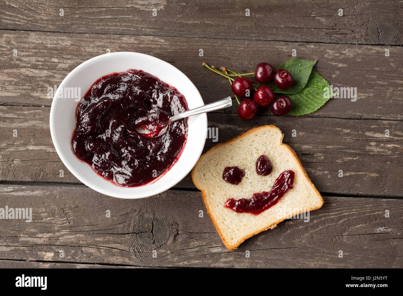 happy face bread, strawberry jam, cherry, breakfast concept Stock Photo ...