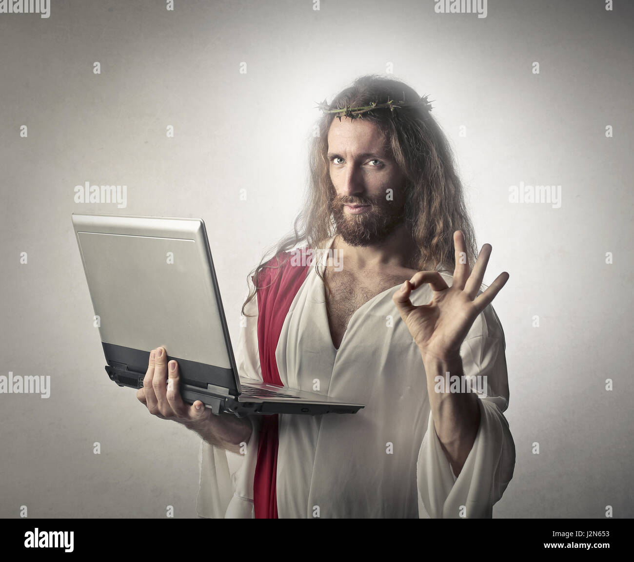Man holding sign jesus christ hi-res stock photography and images - Alamy