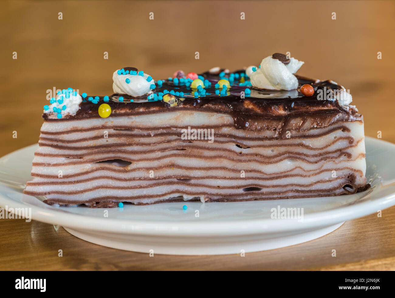 Slice of thousand layers cake, famous French cake Stock Photo - Alamy