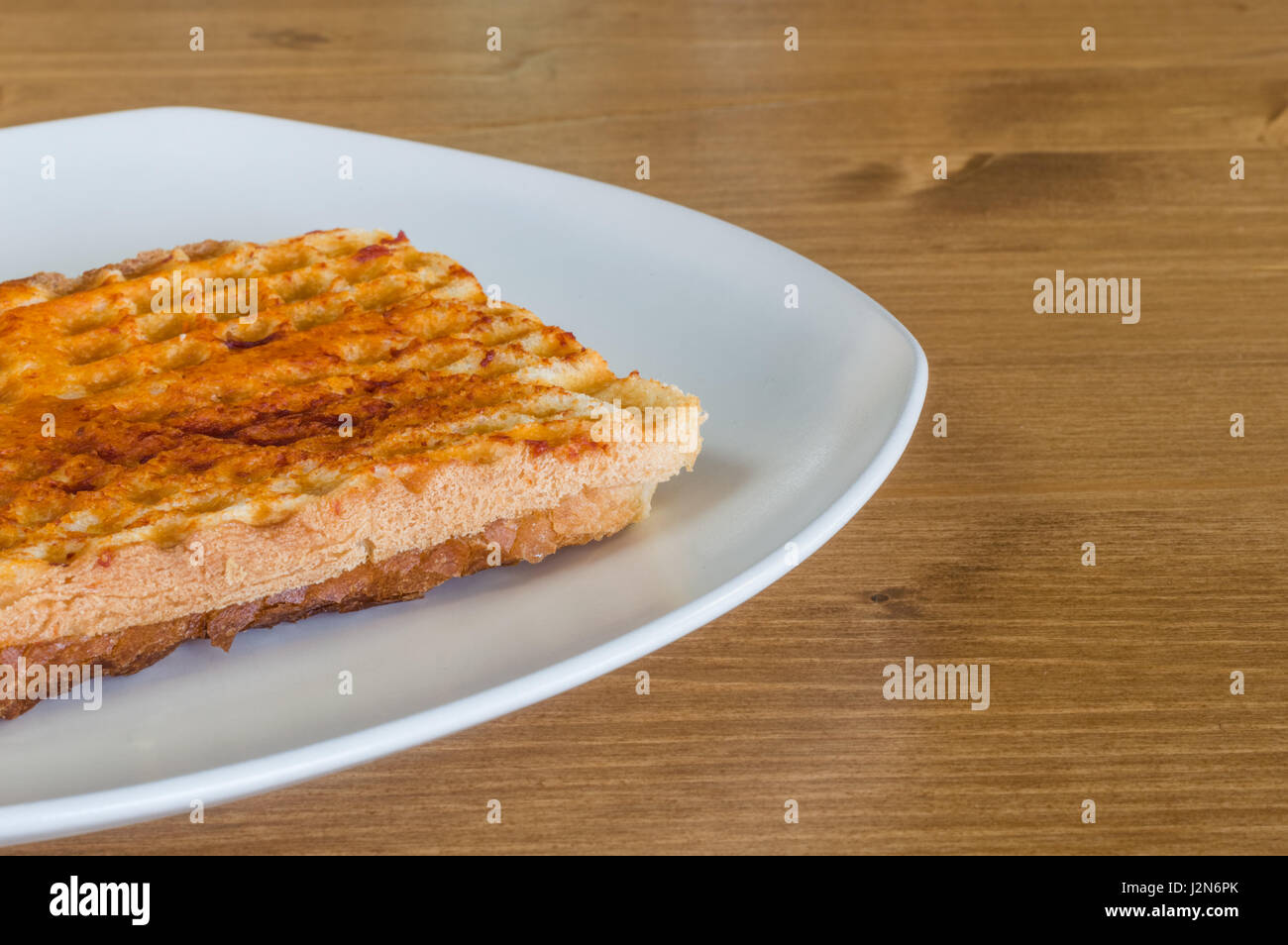 Closeup of Turkish toast, toasted sandwich with cheddar cheese served ...