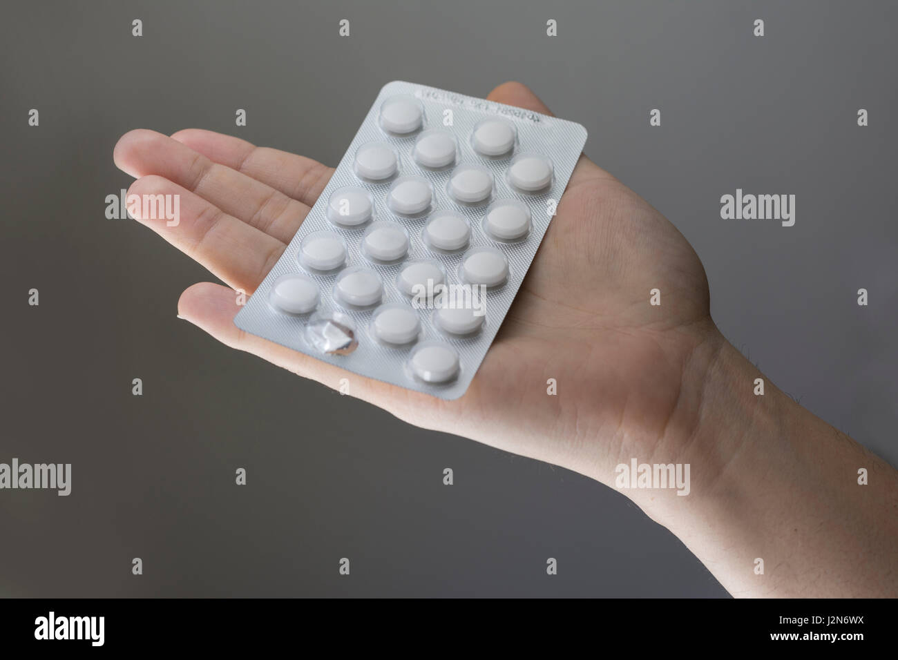 Tablets inside hand High Resolution Stock Photography and Images - Alamy