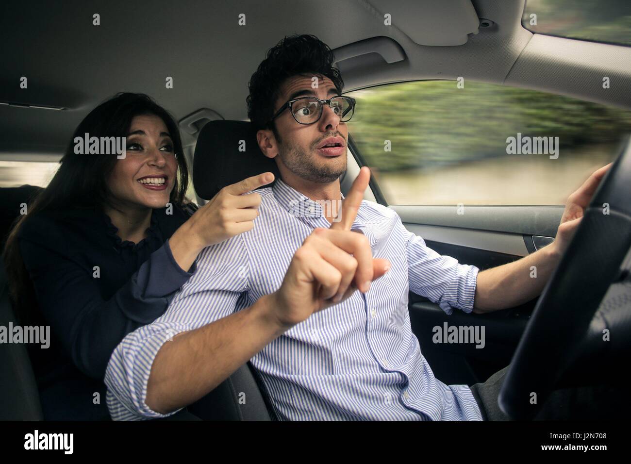 Lost woman and man in car Stock Photo - Alamy