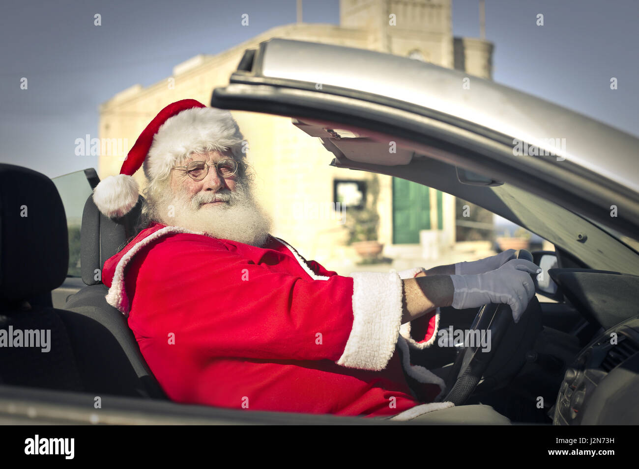 Santa Claus in car Stock Photo - Alamy
