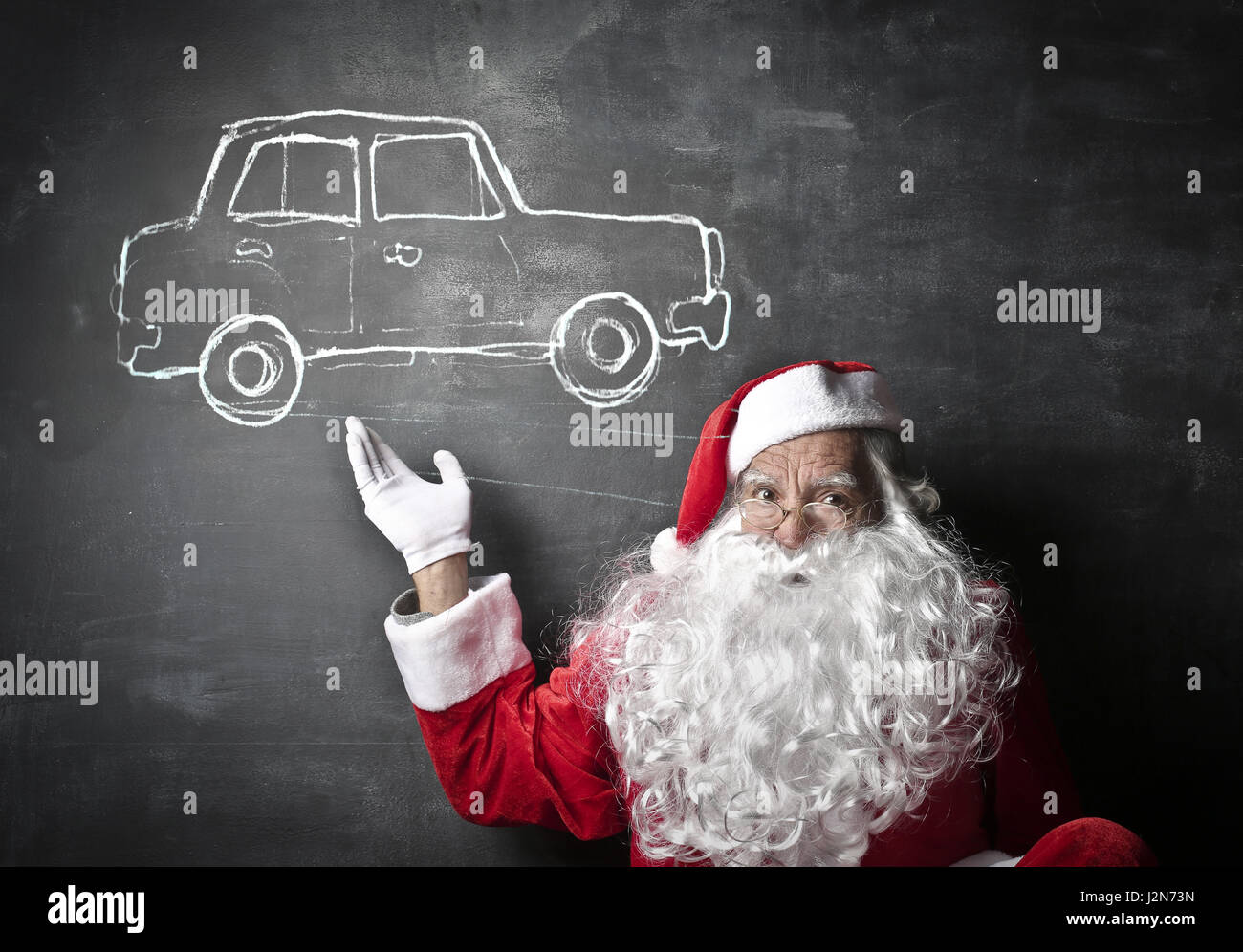 Santa Claus with drawn car Stock Photo - Alamy