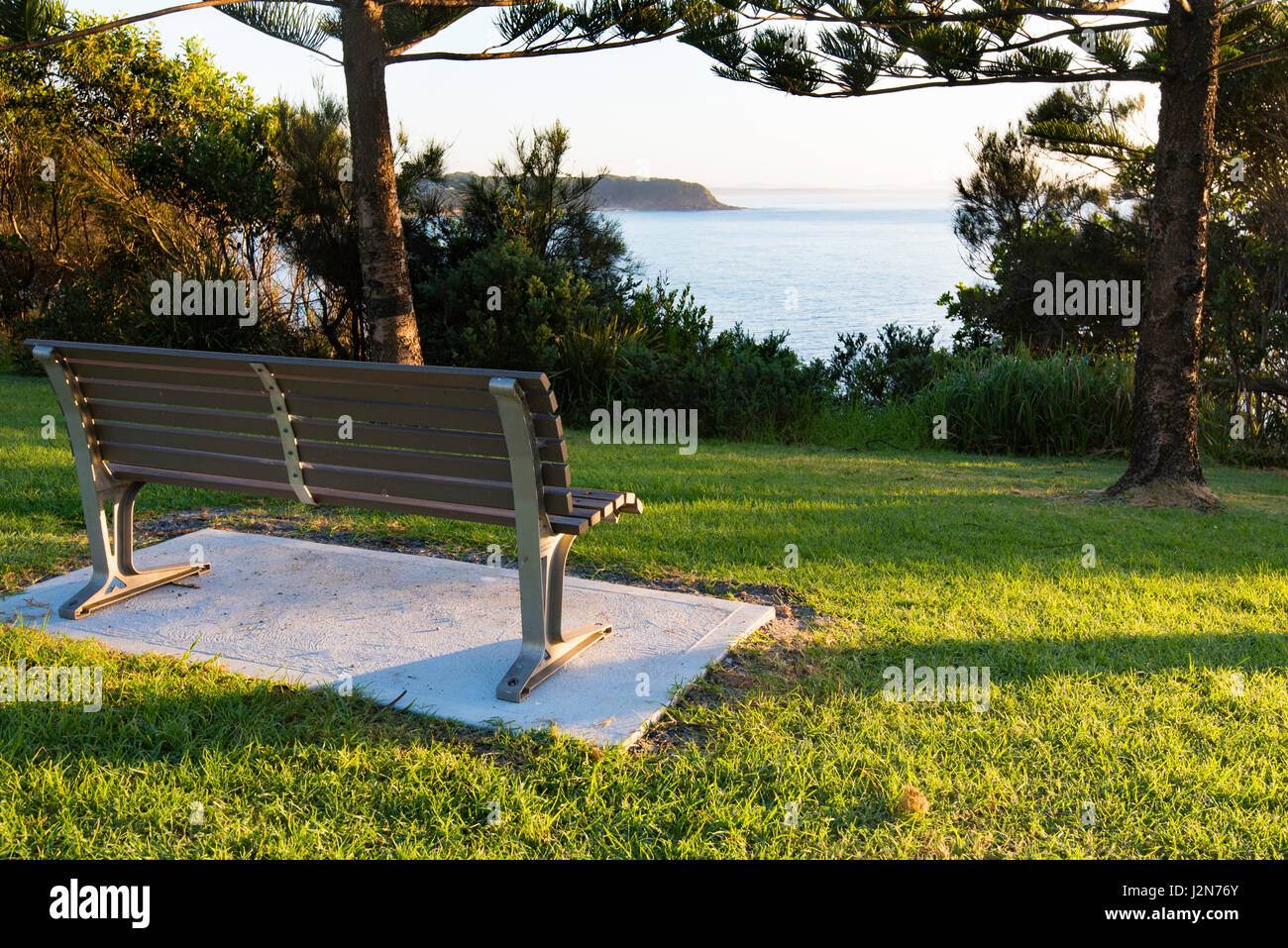 A park bench with a view over the ocean at Hallidays Point, NSW ...