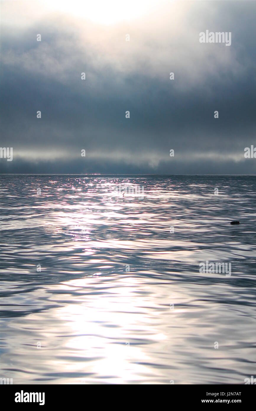 Overcast Skies at Sea during Sunset Stock Photo - Alamy