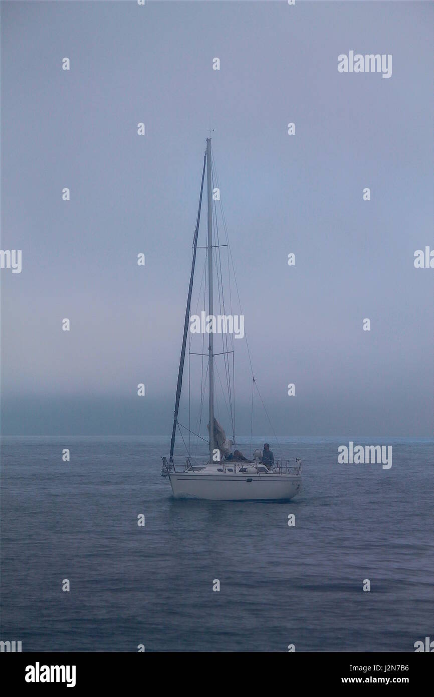 White sail boat on sea hi-res stock photography and images - Alamy
