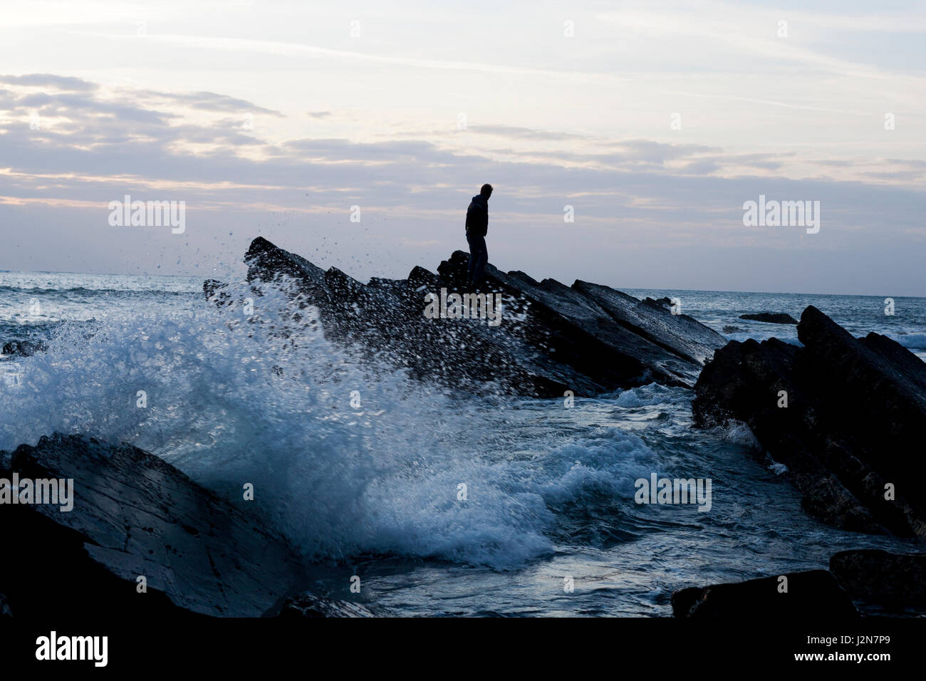 Walking on the rocks Stock Photo - Alamy