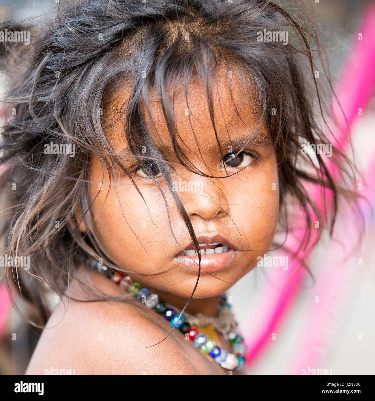 Young children sitting side road hi-res stock photography and images ...
