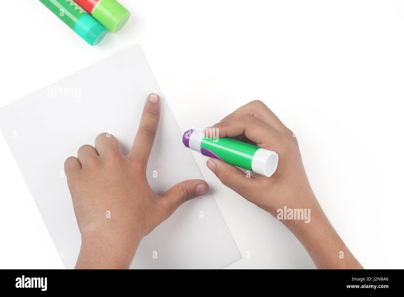 Child glue stick hi-res stock photography and images - Alamy