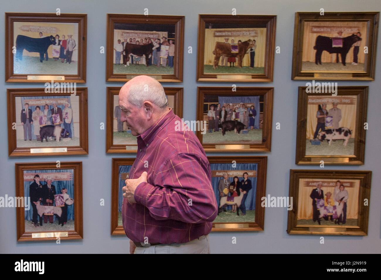 U.S. Agriculture Secretary Sonny Perdue walks past livestock show ...