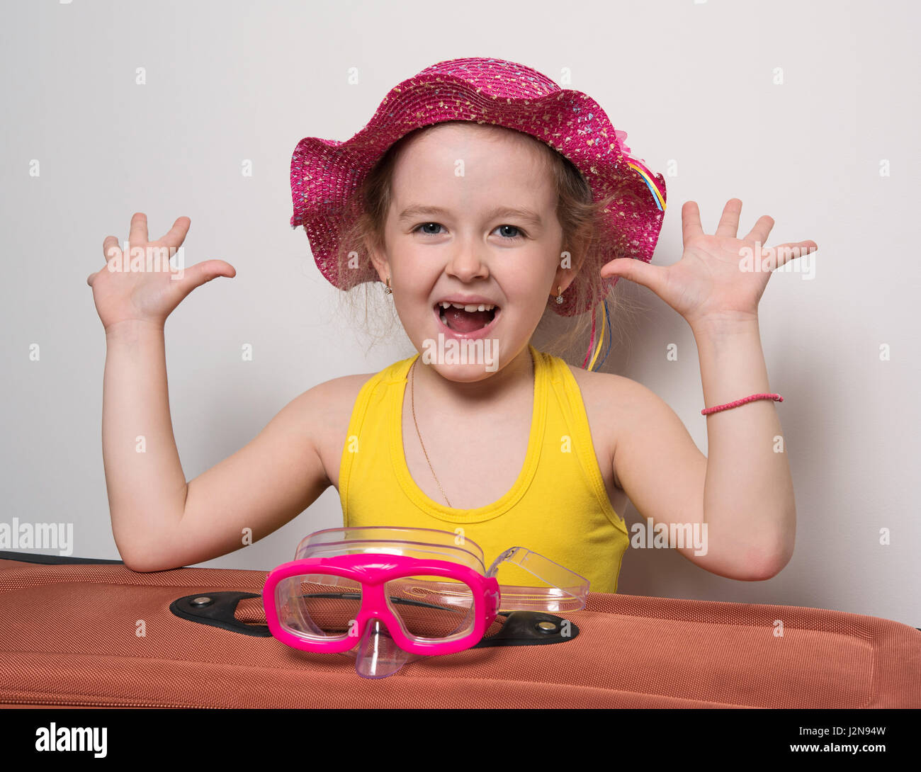 very happy girl with a suitcase Stock Photo - Alamy