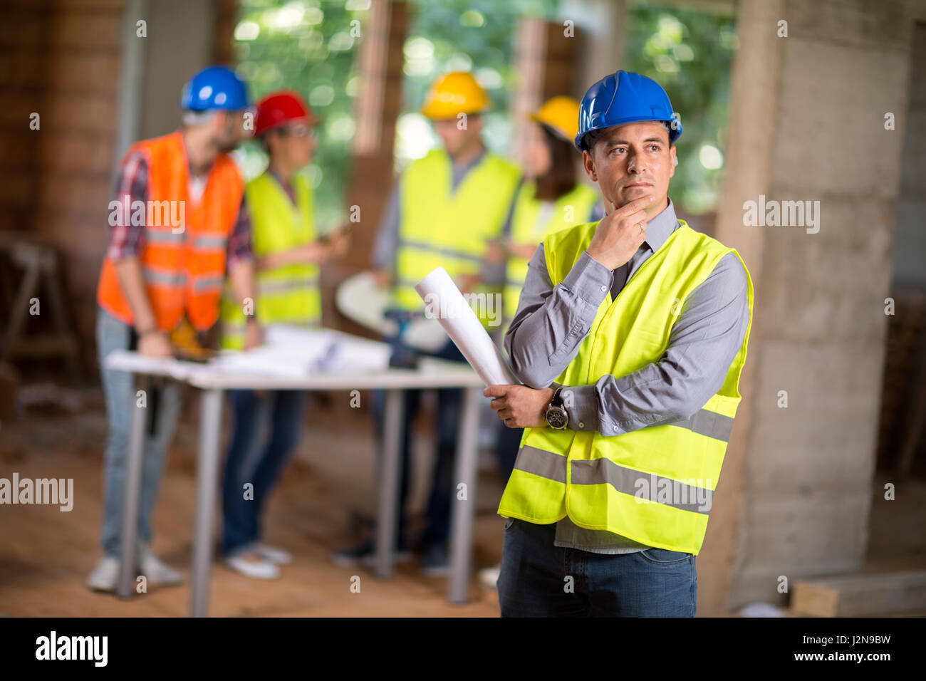 Male architect design architectural solution on construction site Stock ...