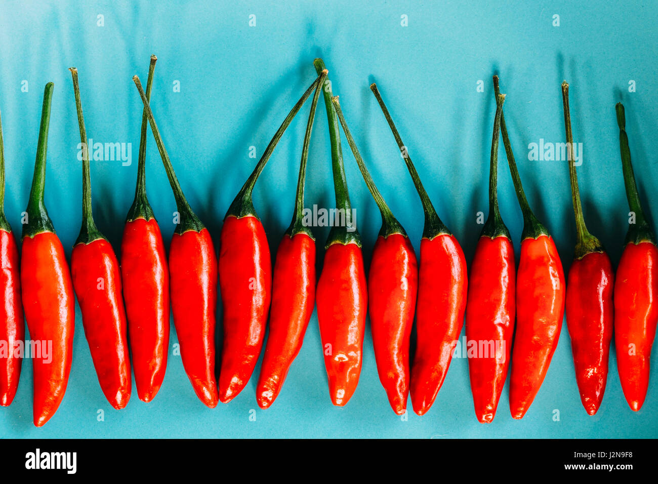 Raw red chillies hi-res stock photography and images - Alamy