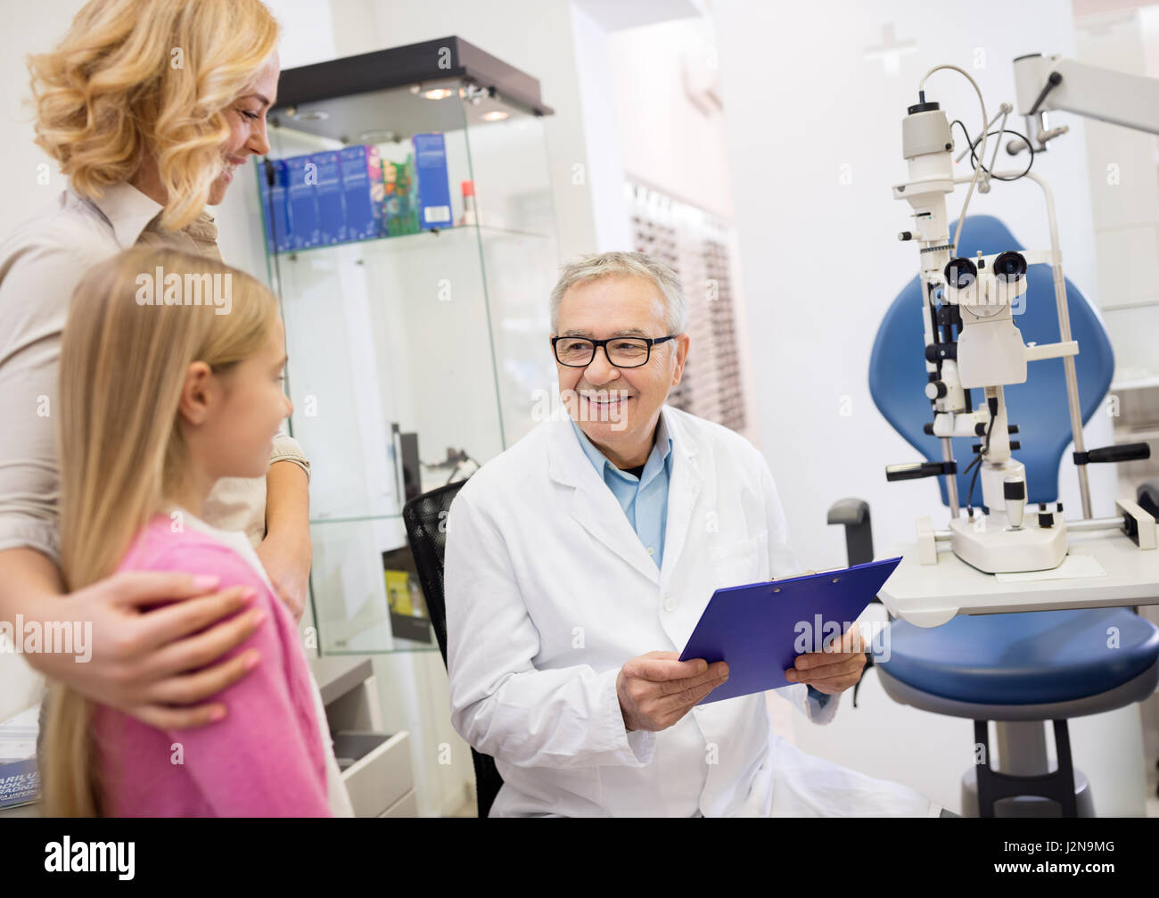 Older experienced doctor is satisfied with results of child's review ...