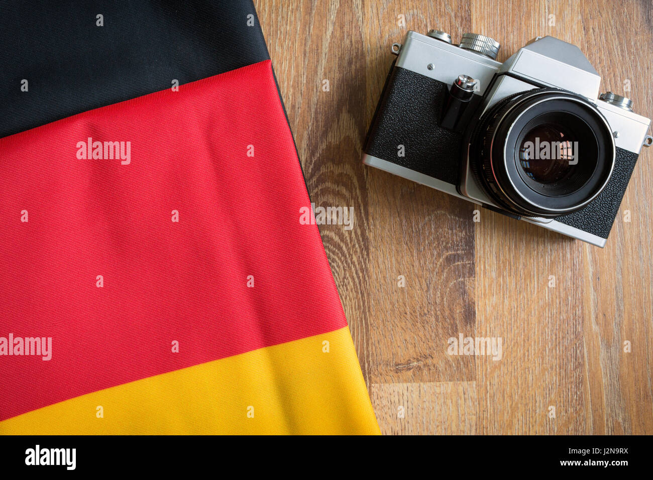 top view Germany flag and retro photo camera background Stock Photo - Alamy