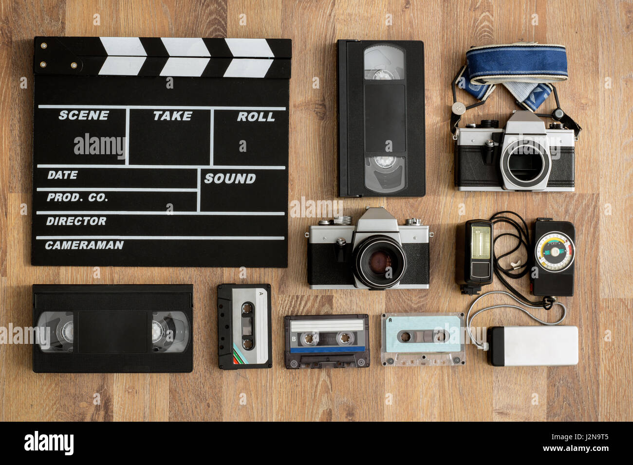 Old retro equipment on wooden boards top view Stock Photo - Alamy