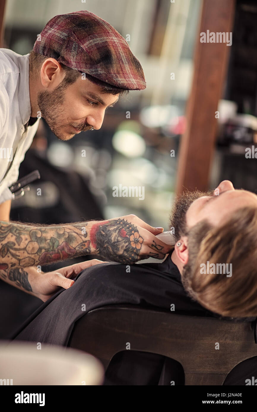 skillful barber shaving beard on client Stock Photo - Alamy skillful barber shaving beard on client Stock Photo - Alamy