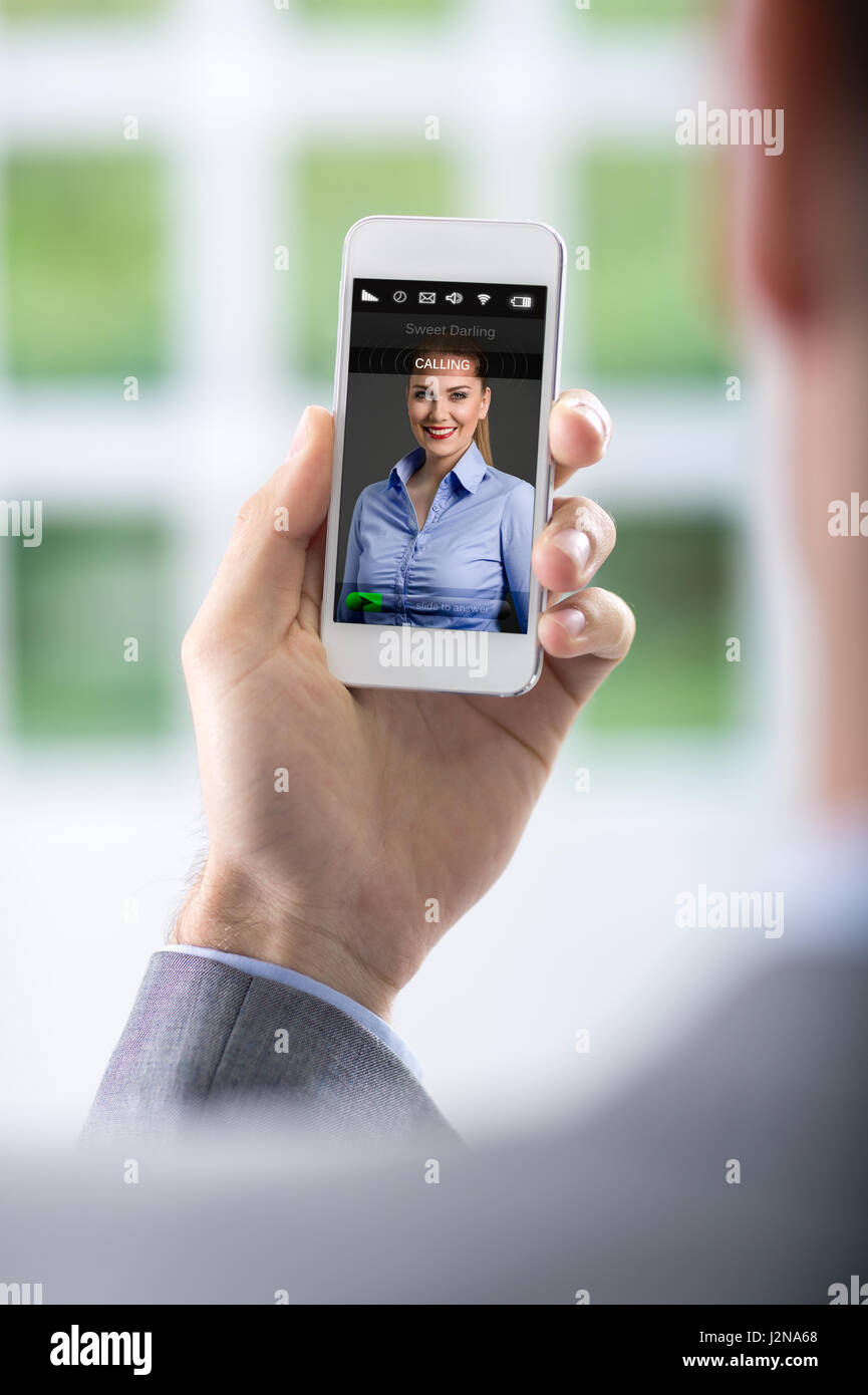 male receiving a call from his girlfriends Stock Photo - Alamy