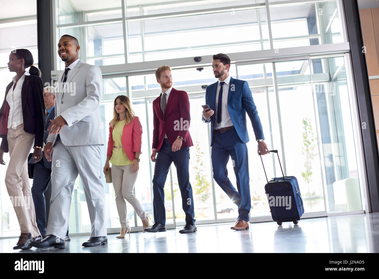 Young business people go to work Stock Photo - Alamy