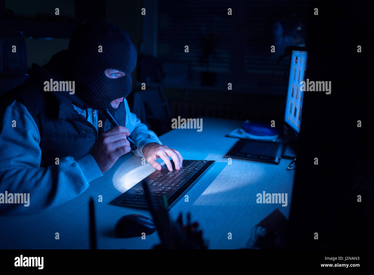 Man computer hacker binary hi-res stock photography and images - Alamy