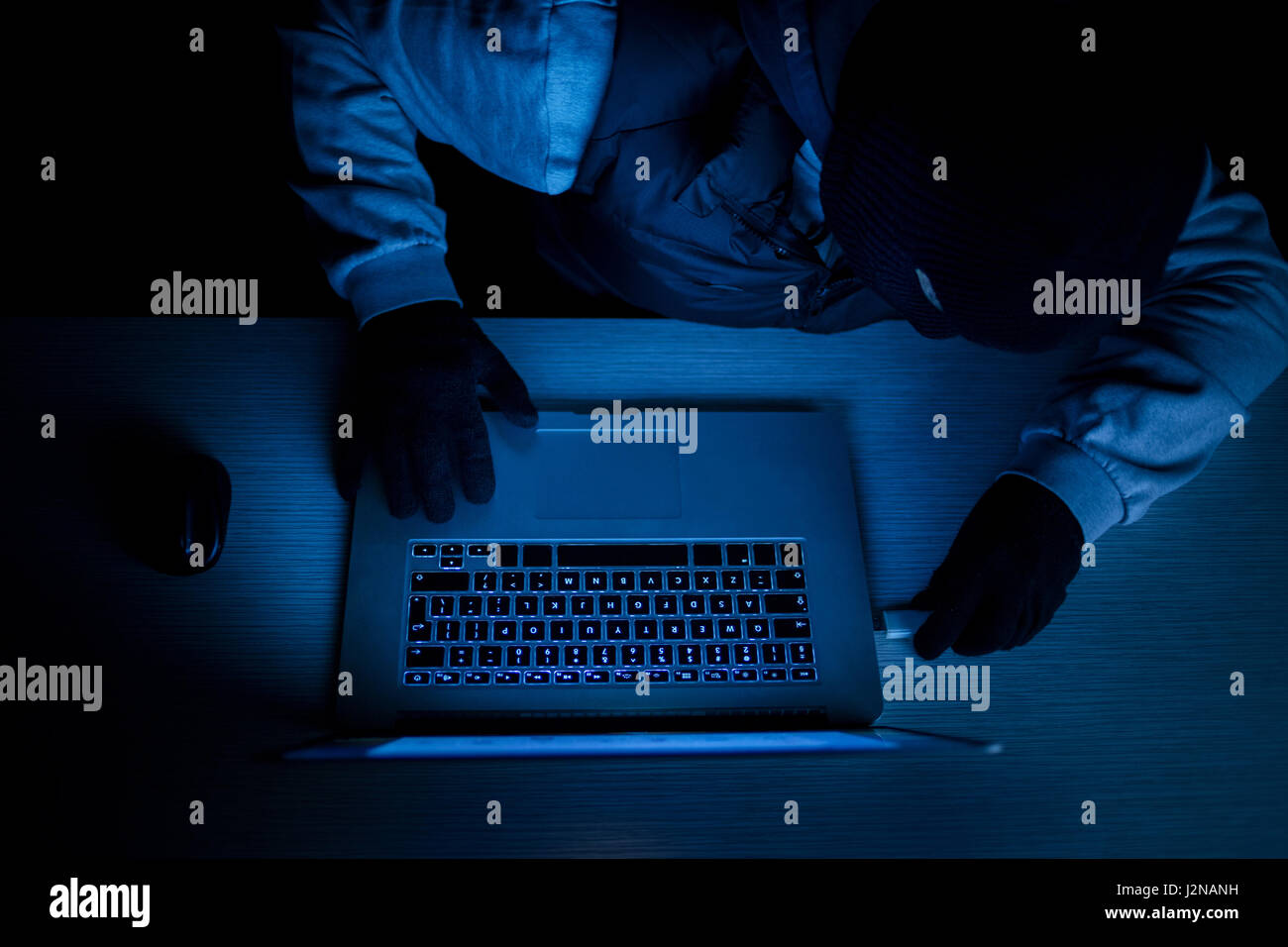 Hacker in stealing information hi-res stock photography and images - Alamy