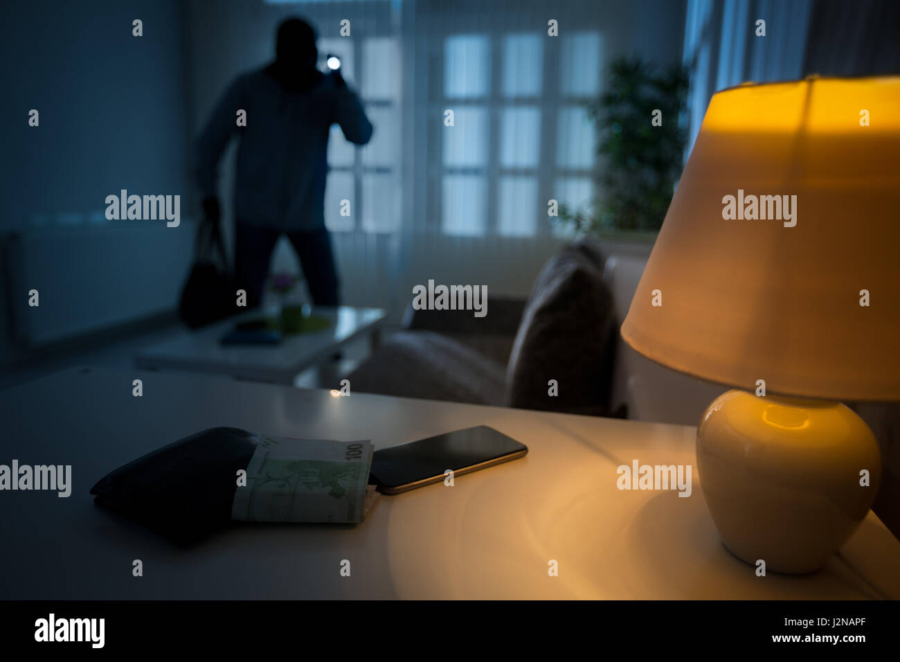 intrusion of a burglar in a house inhabited Stock Photo - Alamy