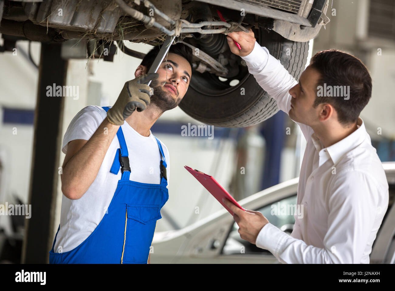 Repair man company hi-res stock photography and images - Alamy