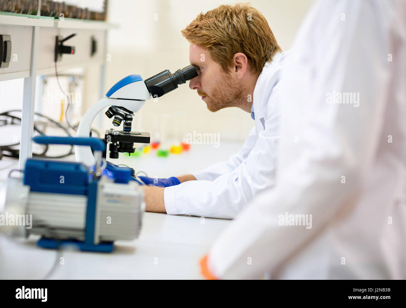 Scientist laboratory man molecule hi-res stock photography and images ...