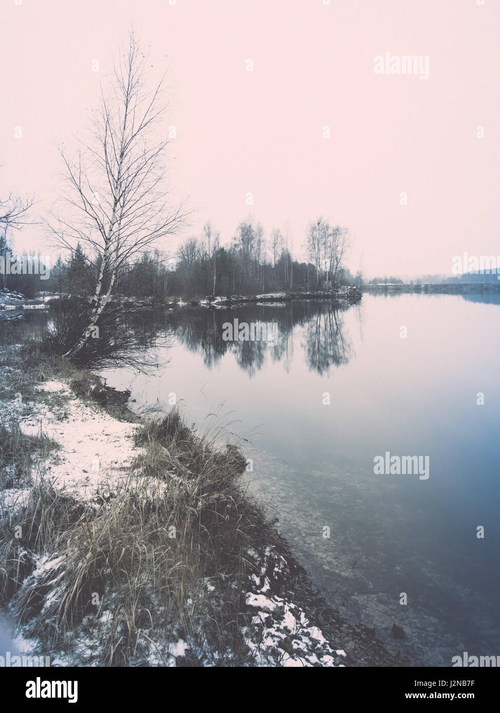cold winter landscape with frozen river and icy water. retro vintage ...