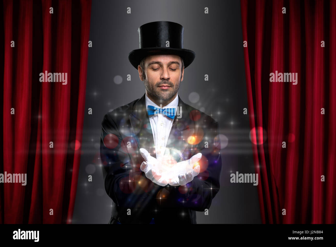 magician holding magic on palm of his hand Stock Photo - Alamy