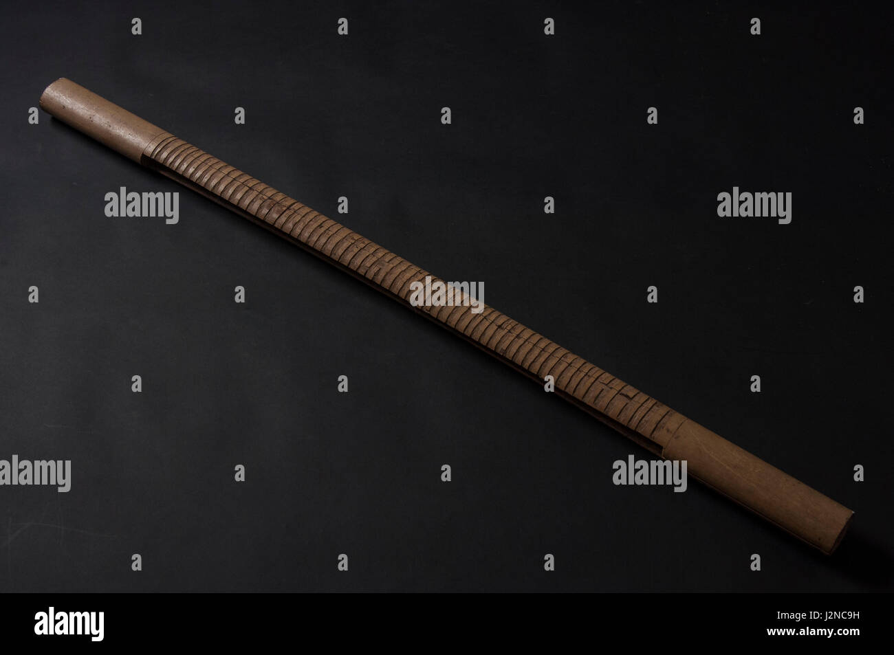 African handmade music instrument isolated on dark background Stock ...