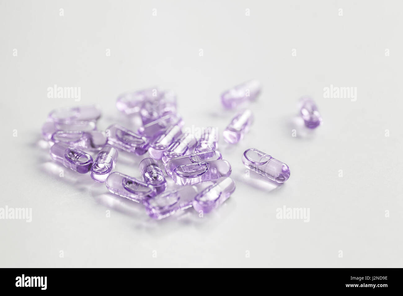 Purple Capsule pills use in pharmaceutical manufacturing, drug ...