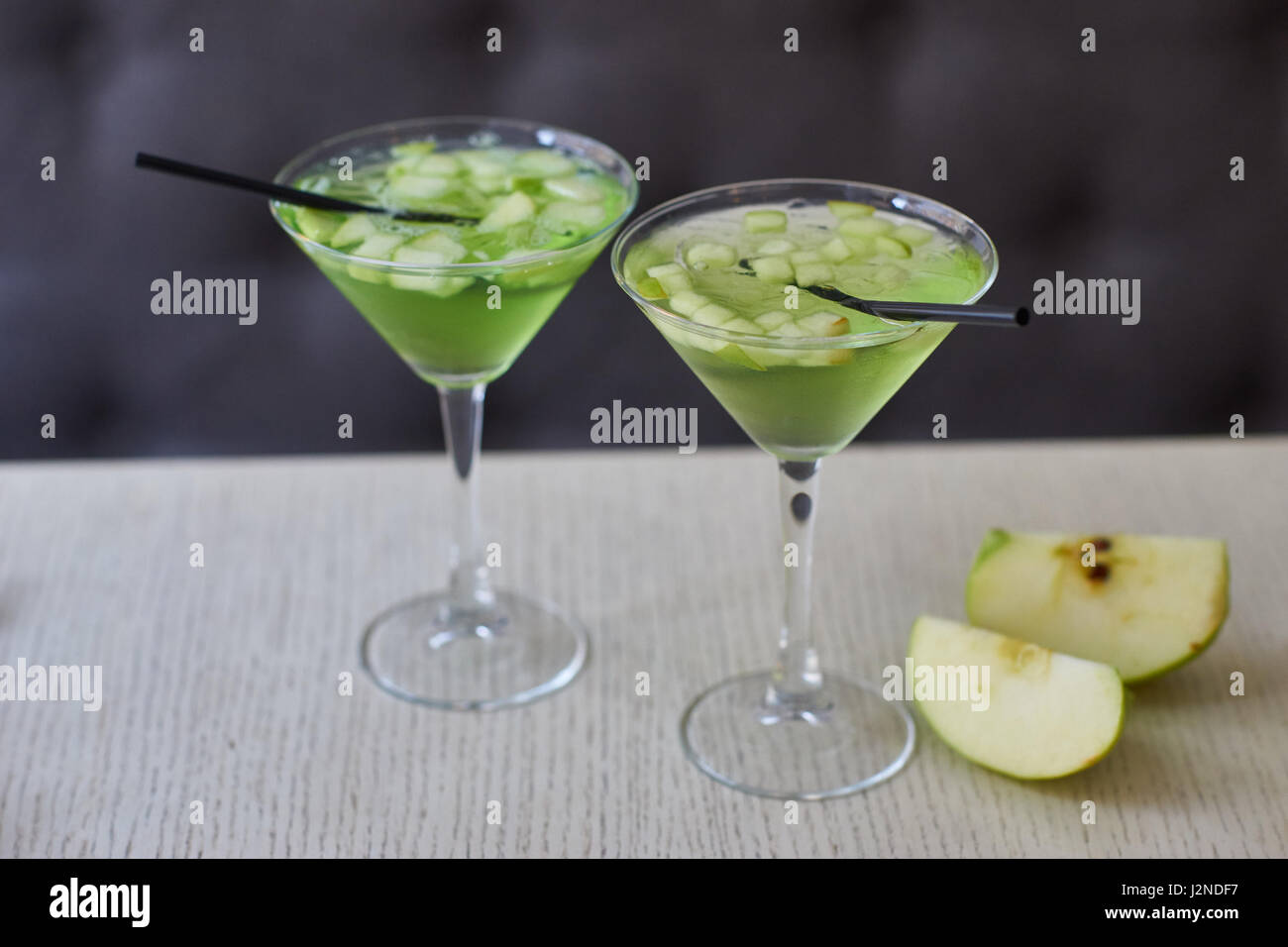 Two glasses of apple martini Stock Photo - Alamy