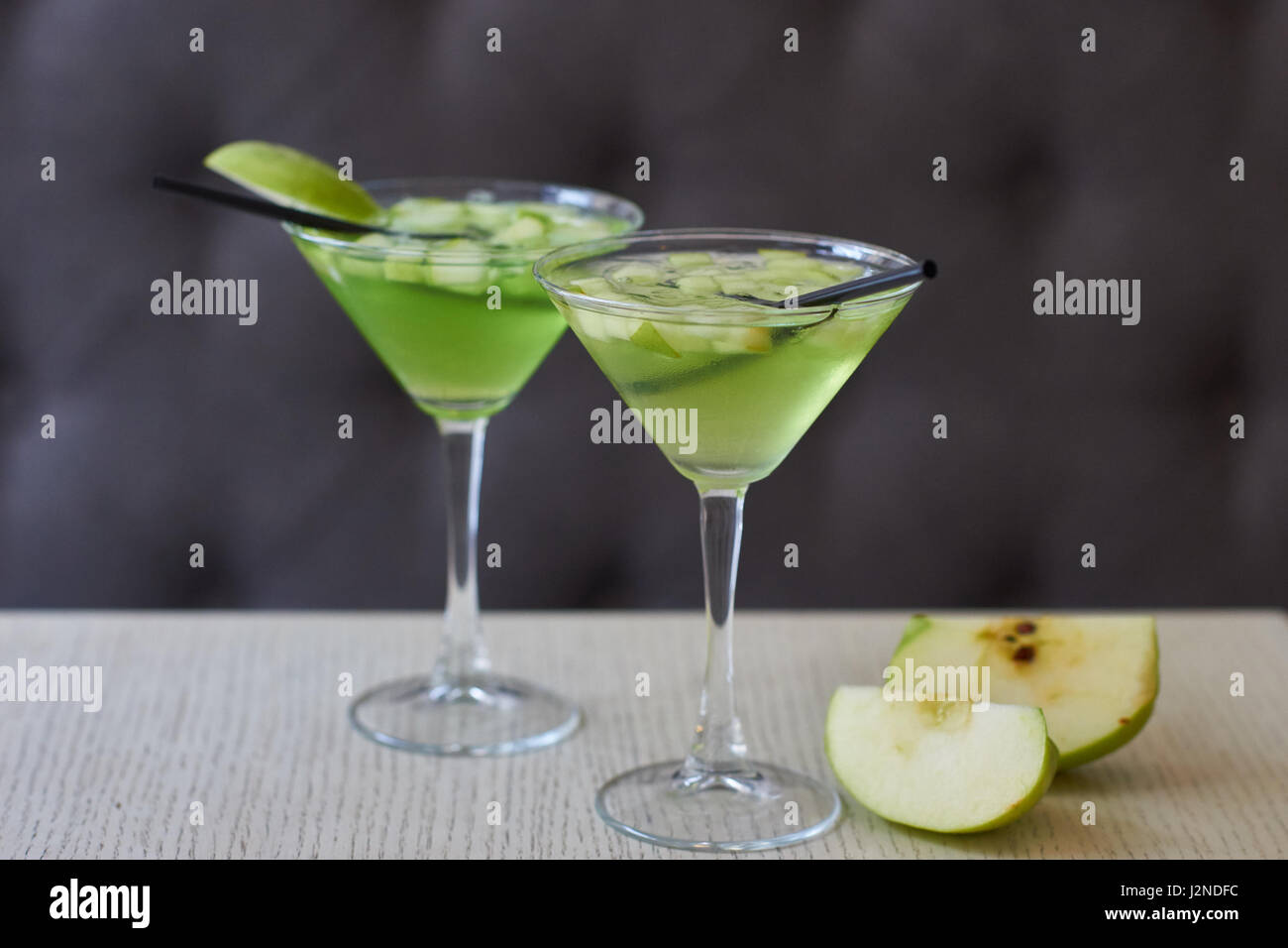 Two glasses of apple martini Stock Photo - Alamy